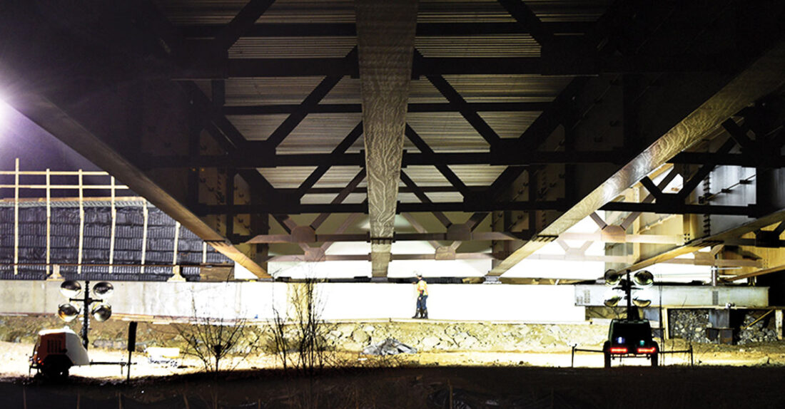 Sliding into Place: Workers positioning Colonel Ruby Bradley Bridge in ...